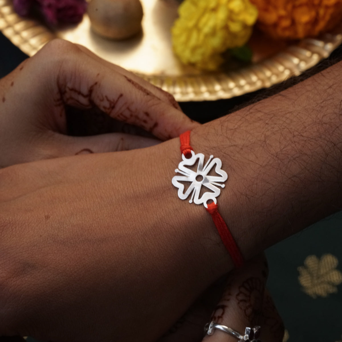 Silver Laser cut Flower Rakhi