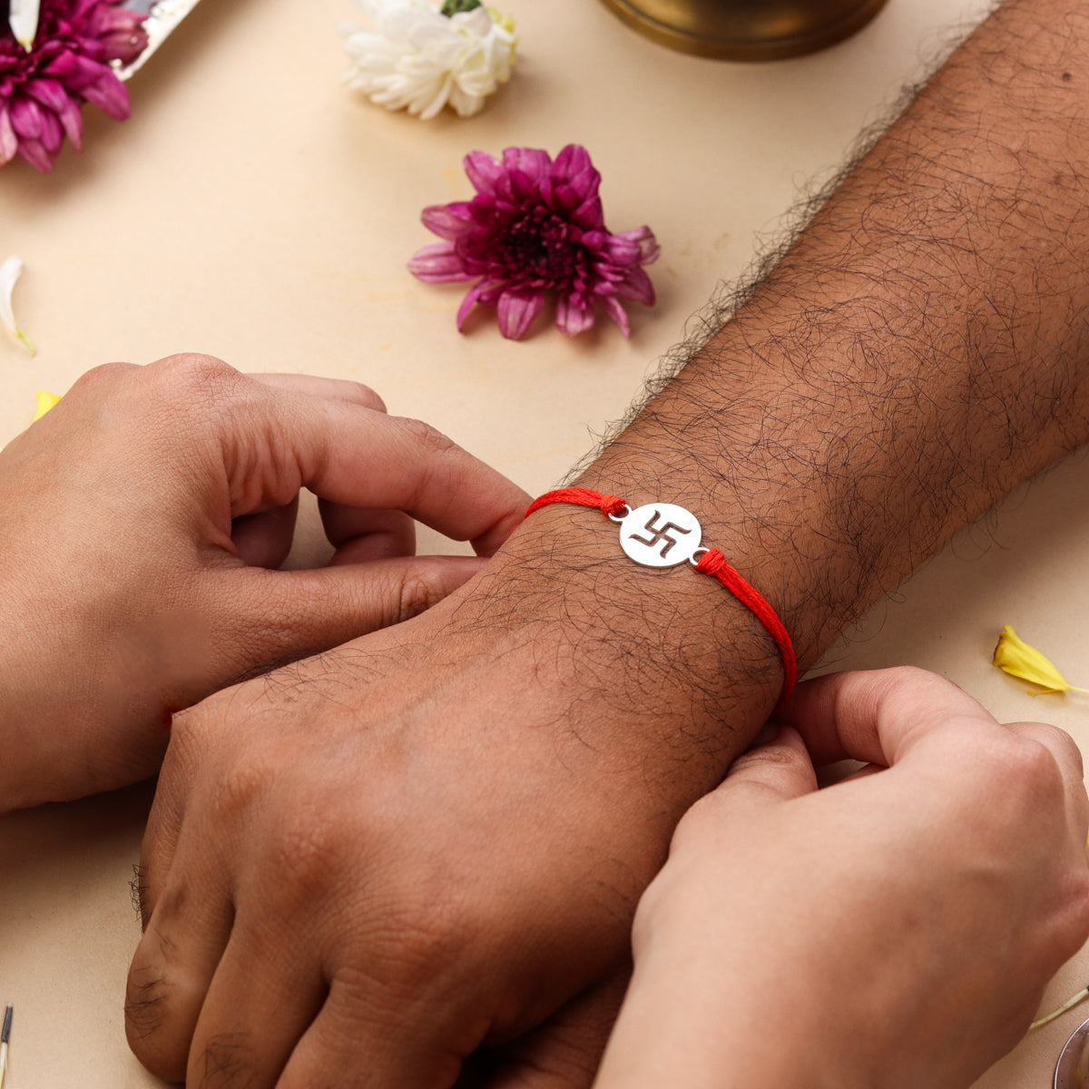 Silver Laser Cut Swastik Rakhi (mini)