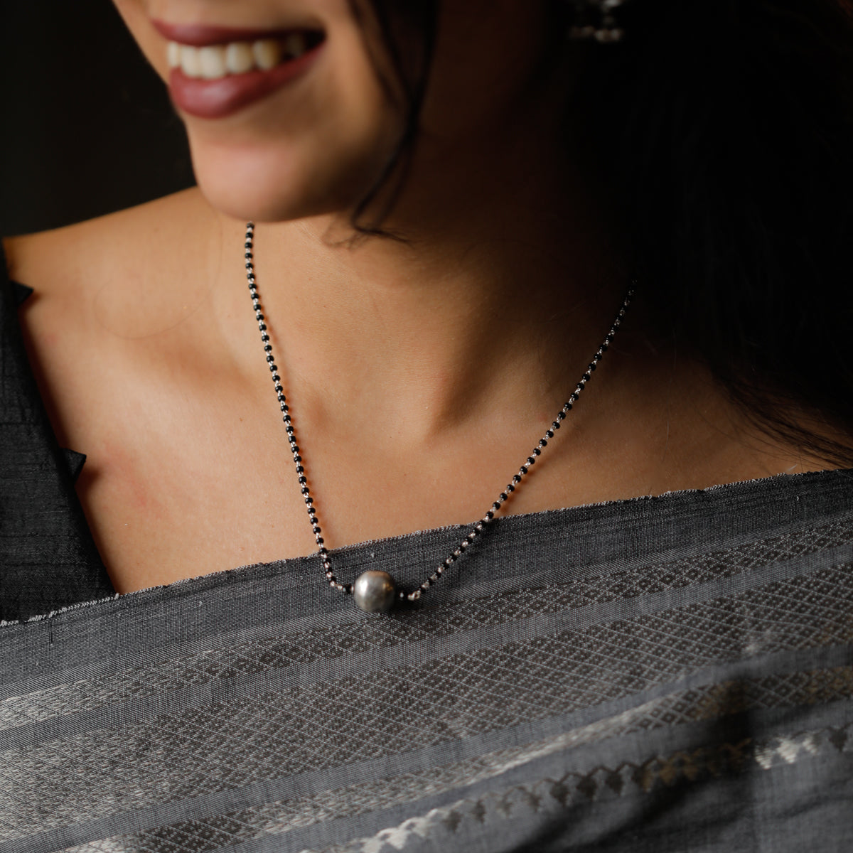 Silver chain with black beads store